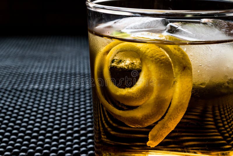 Highball Cocktail with Lemon Peel and Ice. Stock Photo - Image of ...