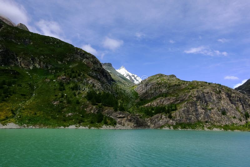 Highest Mountain with a Sharp Peak and Snow between Other Mountains and ...