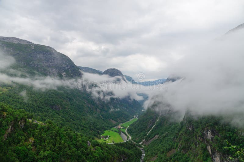 Highland and Valley Covered by Low Density Clouds Stock Photo - Image ...