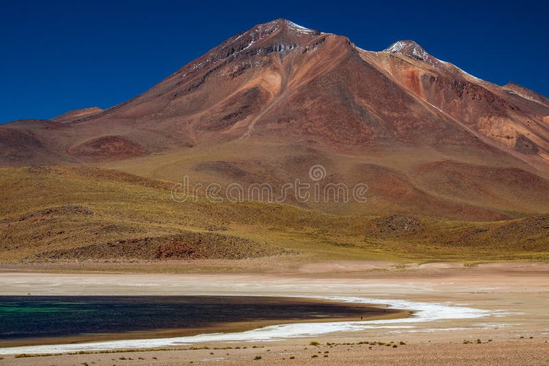 The Highlands Lake End with Red Mountains in Atacama Stock Image ...