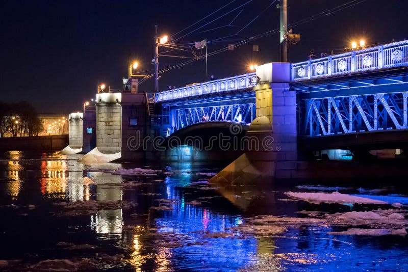 Highlighted Bridge at Night Under Bridge with Reflection on Water Stock ...