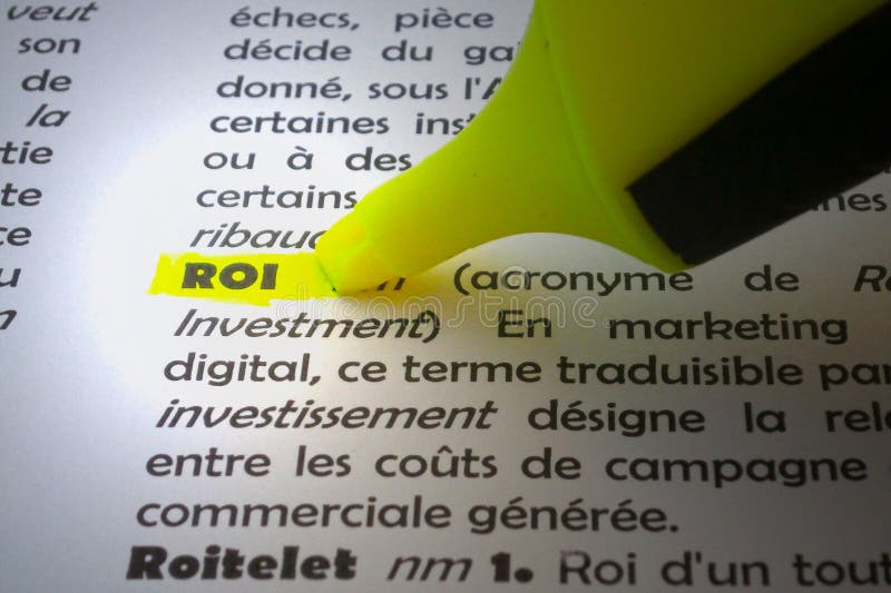 Highlighted ROI Meaning in a French Dictionary Stock Photo - Image of ...