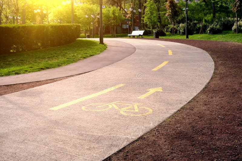Highlighted with Yellow Paint Cycle Path in the City Park Stock Image ...