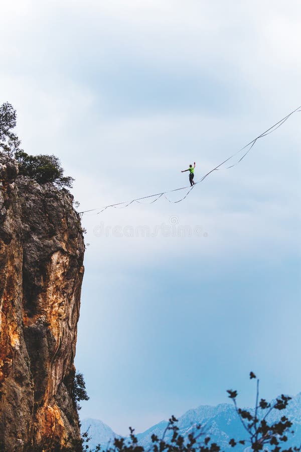 Highliner Balances Over the Abyss Stock Image - Image of cliff ...