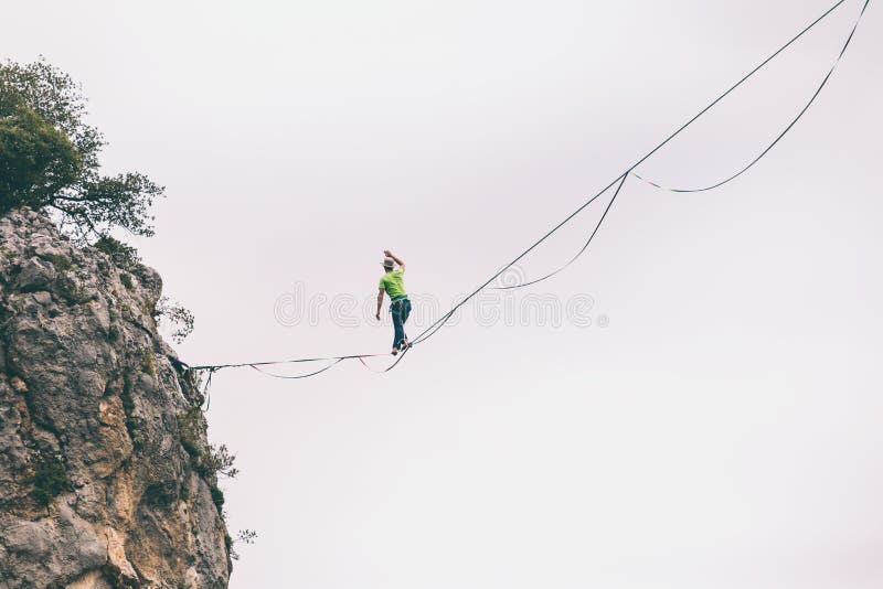 Highliner Balances Over the Abyss Stock Photo - Image of extreme ...