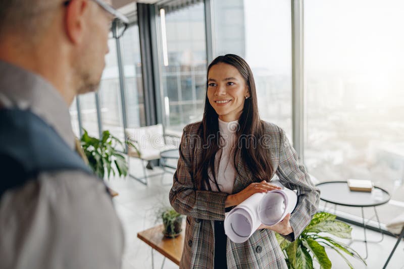 A Dynamic Business Meeting Taking Place in a Modern Office Setting ...