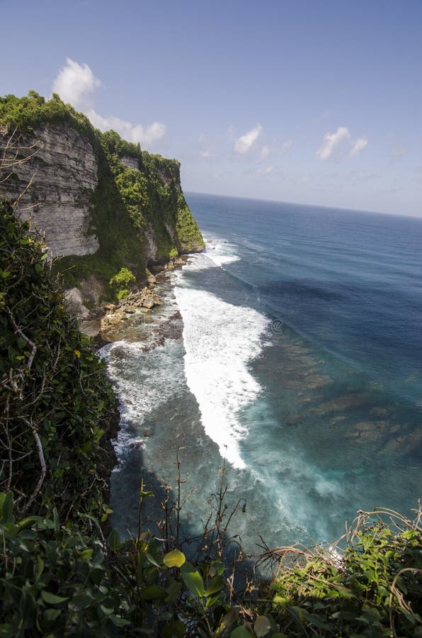 Hight Cilff Hill Next To Deep Blue Sea and Big Wave Stock Image - Image ...