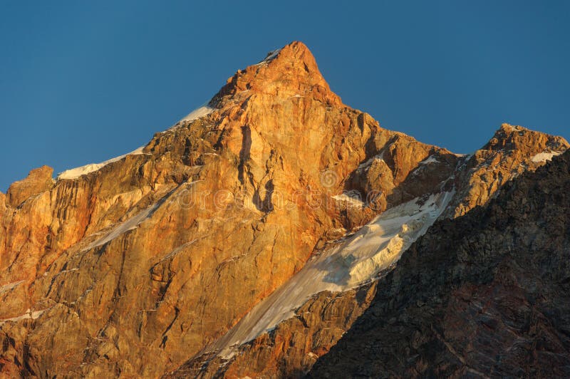 Hight Scarlet Mountain Peak in Sunset Rays Stock Photo - Image of ...