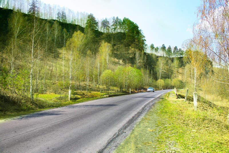 Highway Along Hill in Spring Stock Photo - Image of outdoors ...