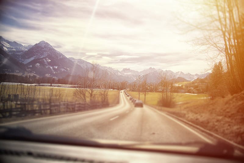 Highway in the Alps. View from Inside Car, Sunset or Sunrise Stock ...