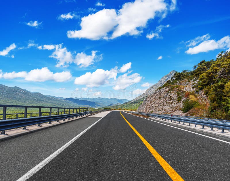 Highway in a Beautiful Mountainous Area. Stock Image - Image of ...