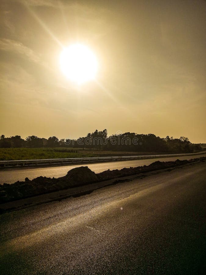 Highway with Beautiful Sunset Stock Photo - Image of beautiful, trip ...