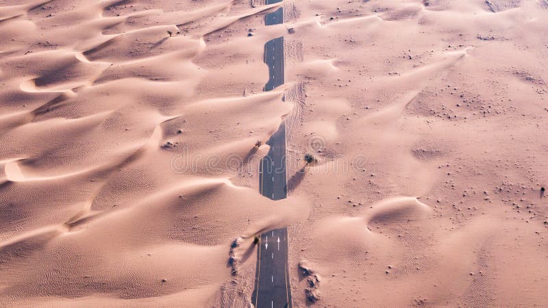 Highway Covered by Sand after a Sandstorm in a Desert in UAE Stock ...