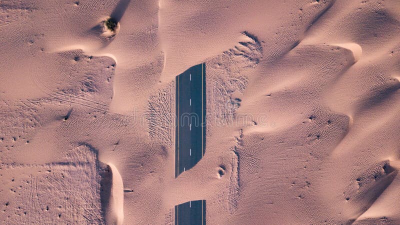 Highway Covered by Sand after a Sandstorm in a Desert in UAE Stock ...