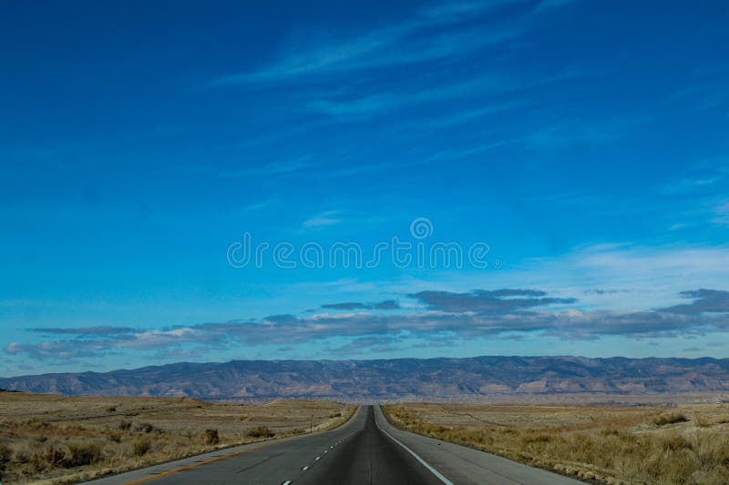 Highway through Desert Landscape with Distant Mountain Range in Arizona ...