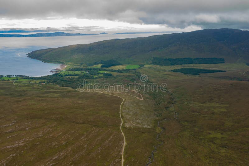 Highway through a Desolate Landscape Stock Photo - Image of ...