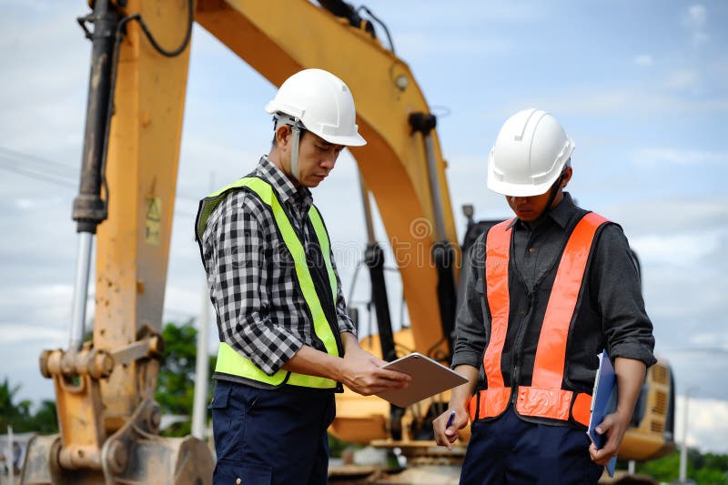 Highway Engineer Consultant and Young Engineer Planning Work Together ...