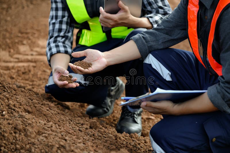 Highway Engineers Touch and Inspect Laterite Soil for Construction ...