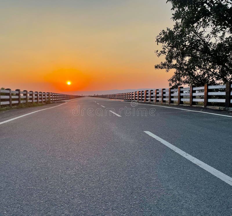 Highway in the Evening with Sun Setting Down Stock Image - Image of ...