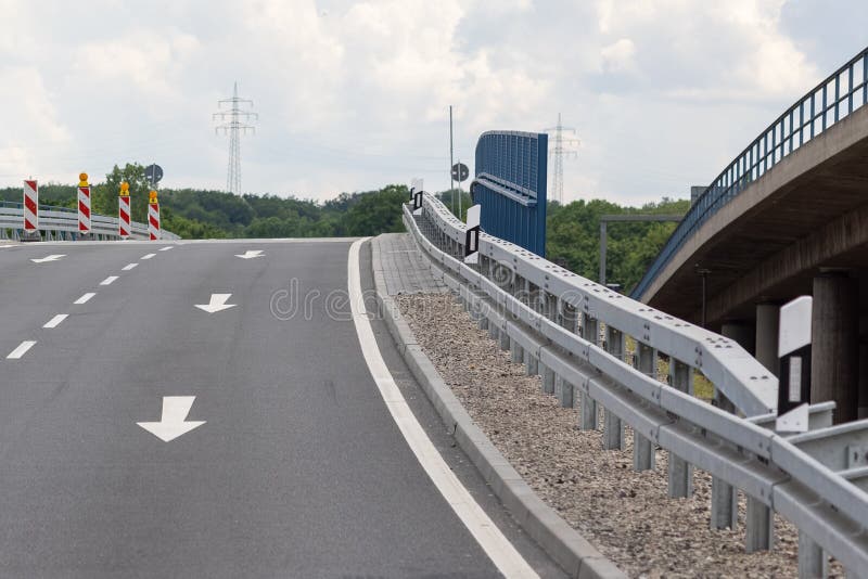 Highway Exit with Arrows Painted on the Road Stock Photo - Image of ...