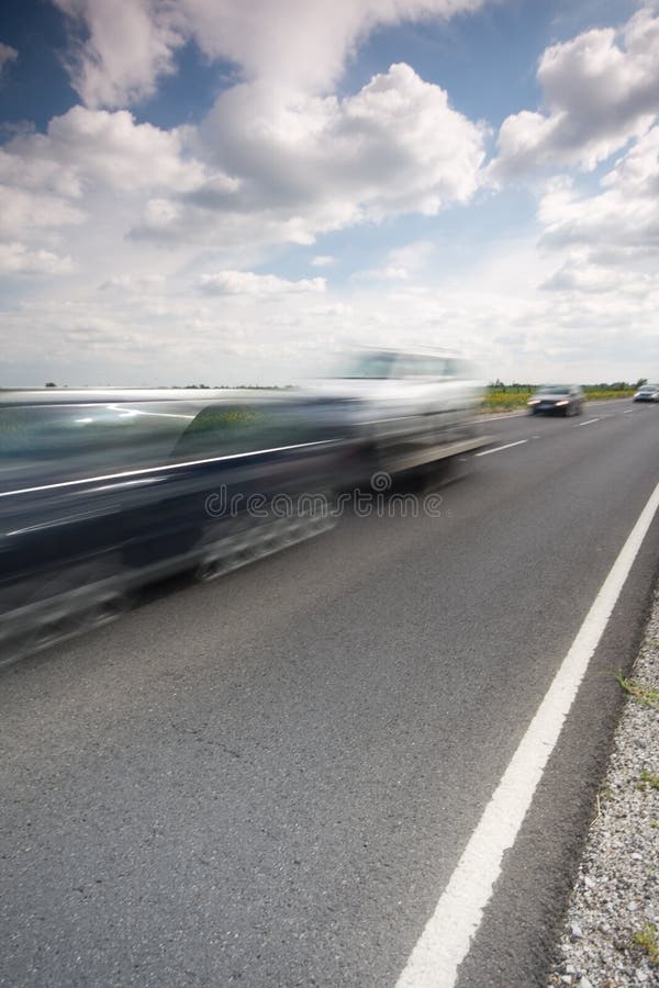 Highway with a fast car stock image. Image of gravel, ride - 6188451