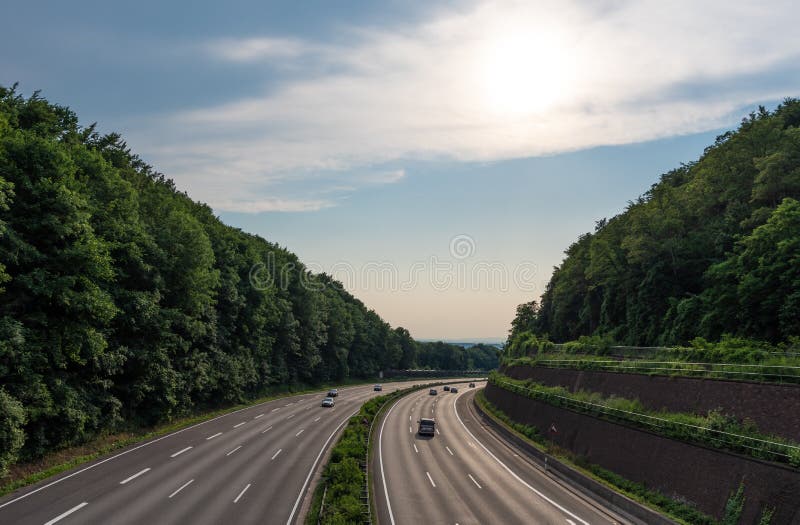 The Highway through a Forest in Germany Stock Photo - Image of road ...
