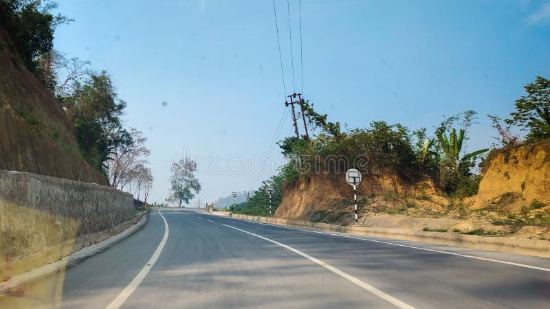 Highway through Hill with Traffic Signals Stock Image - Image of ocean ...