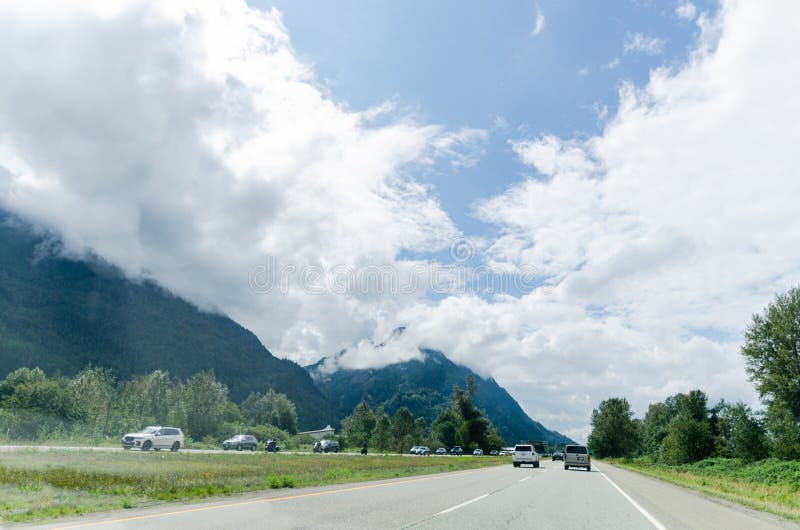 Highway in Hope BC, Canada with Cloud Covered Mountains in the ...