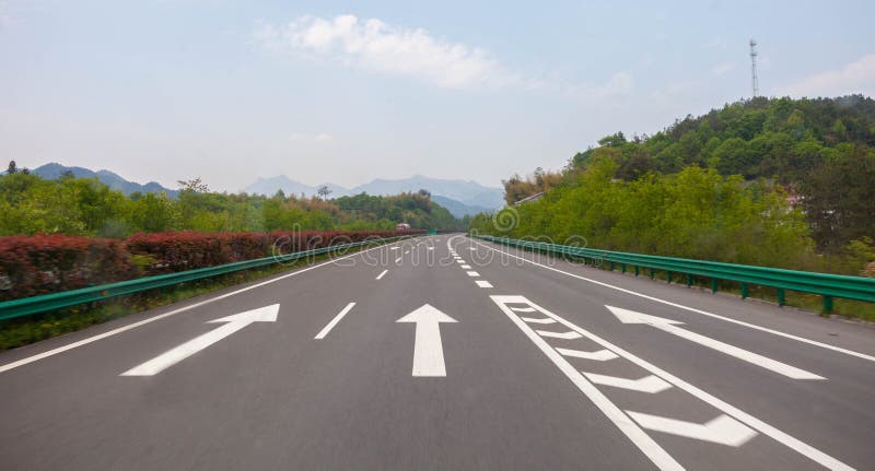 Highway and Indicator Arrow Stock Image - Image of asia, spring: 53661317