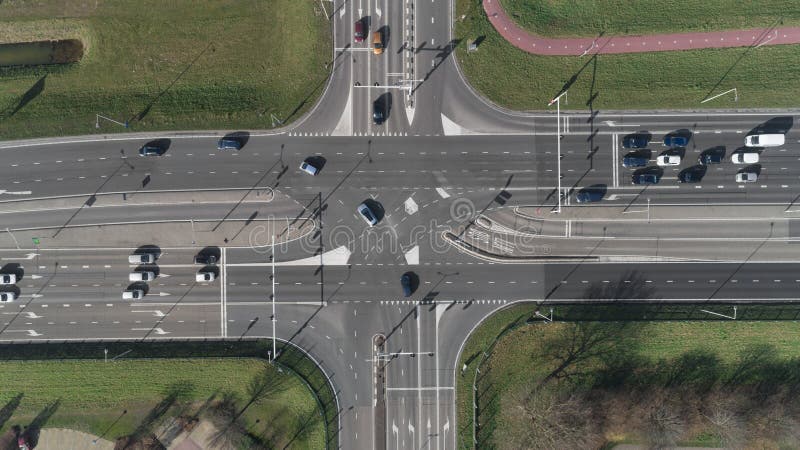 Highway Intersection with Cars and Traffic Lights. Top View from Drone ... Highway Intersection with Cars and Traffic Lights. Top View from Drone ...