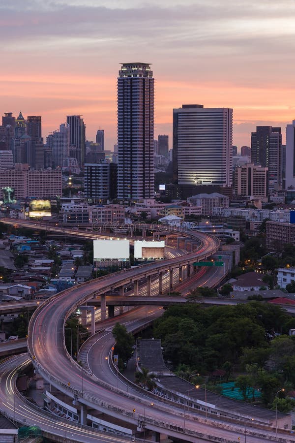 Highway Intersection with City Office Building and Dramatic after ...