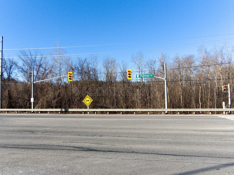 Highway 11 Intersection: Traffic Lights and Road Signs Stock Photo ...