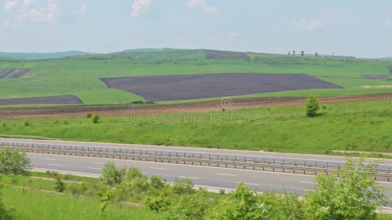 Highway in Spring with Beautiful Bright Sun Rays. Country Road through ...