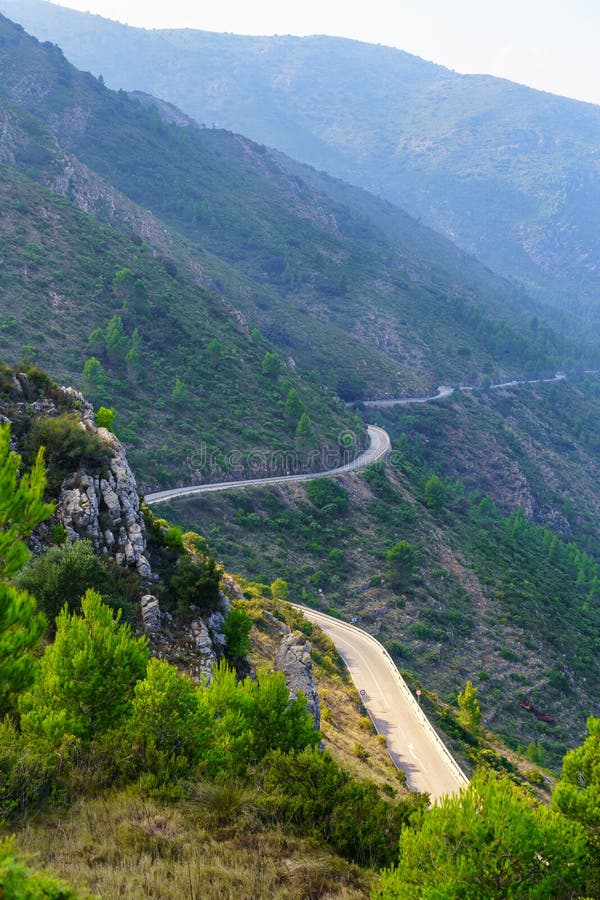 Highway Making Curves Along the Slopes of the Mountain. Spain. Stock ...
