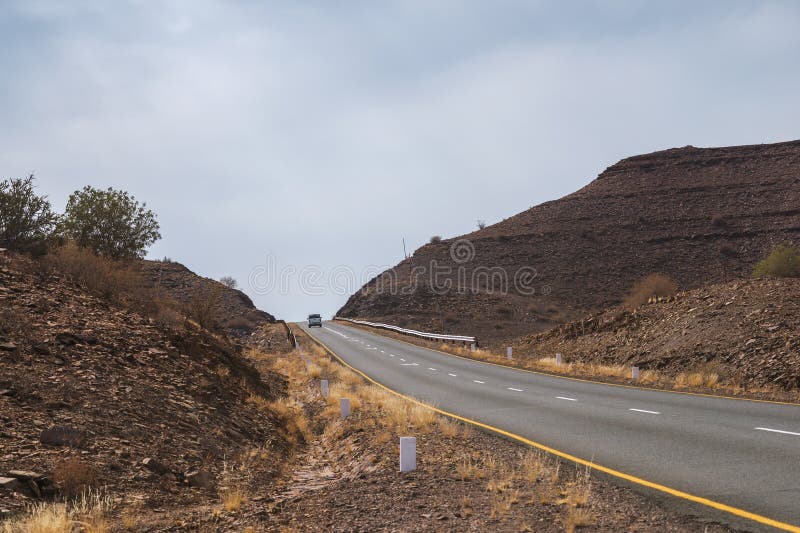 Highway between mountains stock image. Image of drought - 270609751