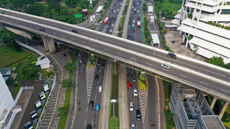 Highway Multi-level Interchange Road with Moving Cars. Cars are Moving ...