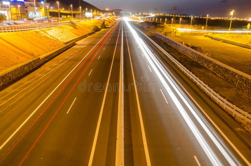 Highway in the Night stock image. Image of background - 196168097