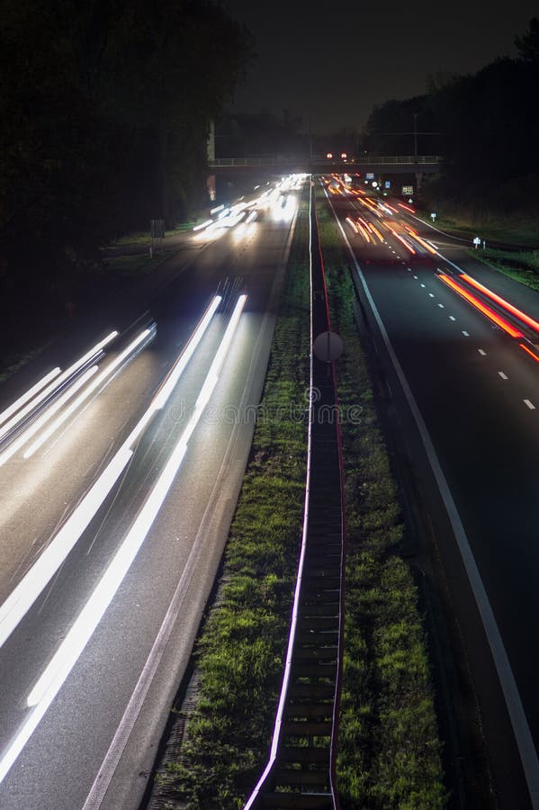 Highway at Night with Traffic Blurred by Motion Stock Photo - Image of ...