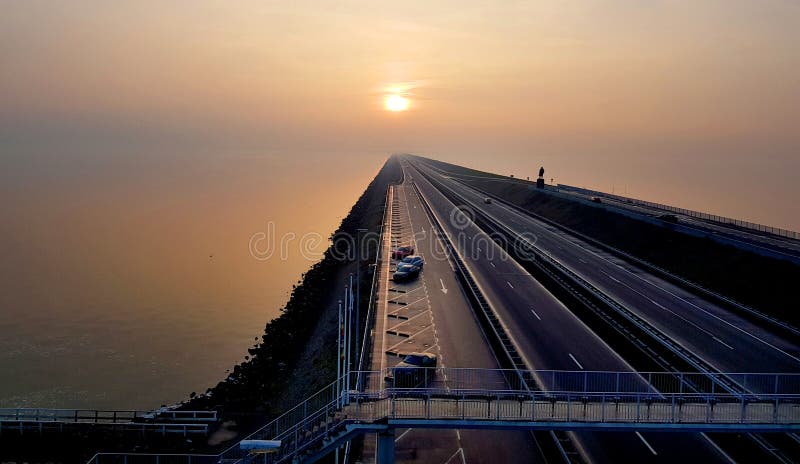 Highway Over Water at Sunrise Stock Photo - Image of dawn, scenic ...