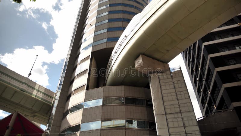 A Highway Passing through the TKP Gate Tower Building in Osaka, Japan ...