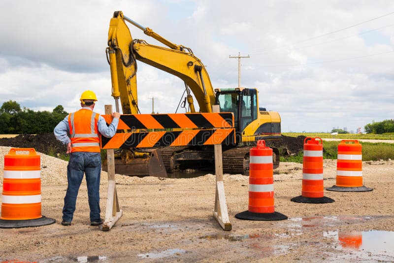 Road Worker With Thermoplastic Spray Road Marking Machine Working To ...