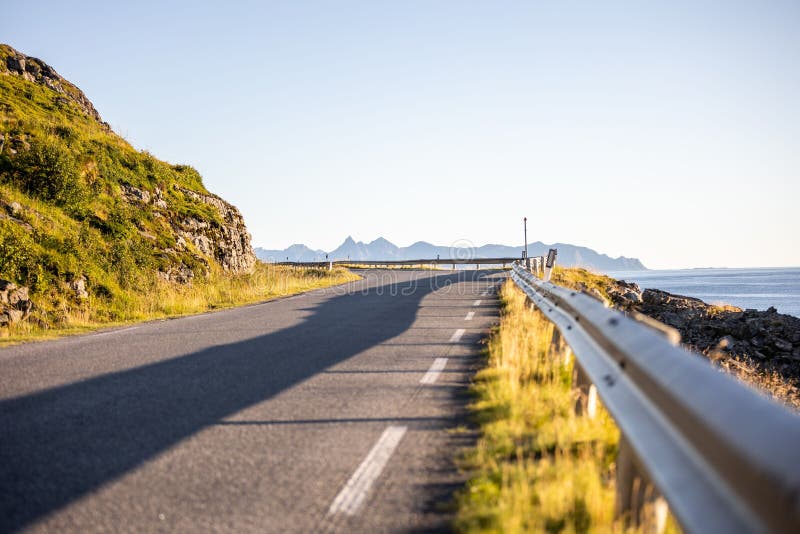 Highway Road on the Green Hillside at the Shore Stock Photo - Image of ...