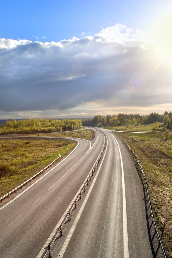 Highway on a sunny day stock photo. Image of countryside - 19889564
