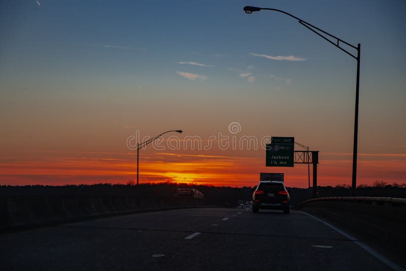 Highway and sunset stock image. Image of darkness, sunset - 177519999