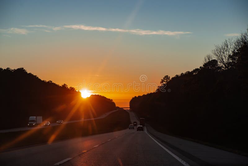 Highway and sunset stock image. Image of continent, dark - 177521897