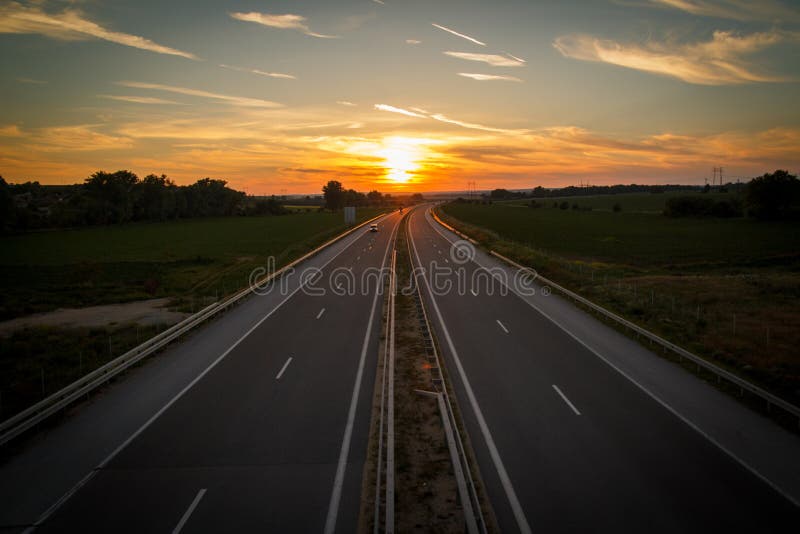 Highway sunset ,centered stock photo. Image of city, highway - 95134818