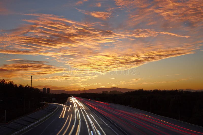 Highway and sunset stock image. Image of dawn, freeway - 121711027