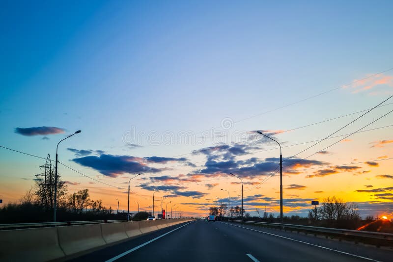 Sunset on the Highway. Asphalt Road in Sun Rays. Empty Track in the ...