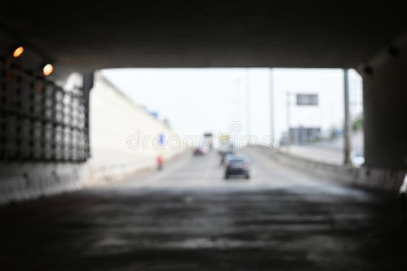 Highway Traffic and Dark Underpass on Road Asphalt Stock Photo - Image ...