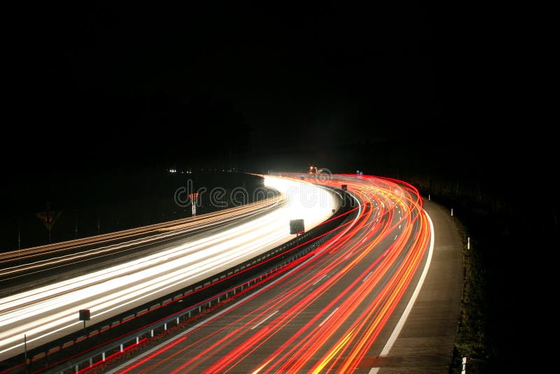 Highway traffic at night stock photo. Image of busy - 138655432